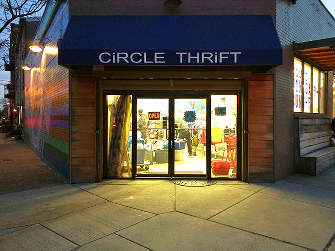 The iconic blue awning of Circle Thrift beckons like a beacon to bargain hunters, promising treasures behind those glass doors that your wallet will thank you for.