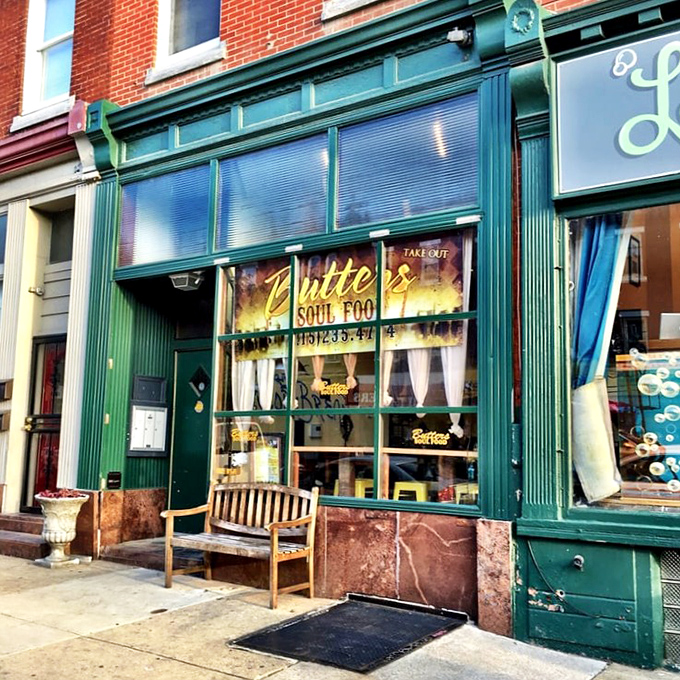 That unassuming green storefront holds more soul food secrets than your grandmother's recipe box.