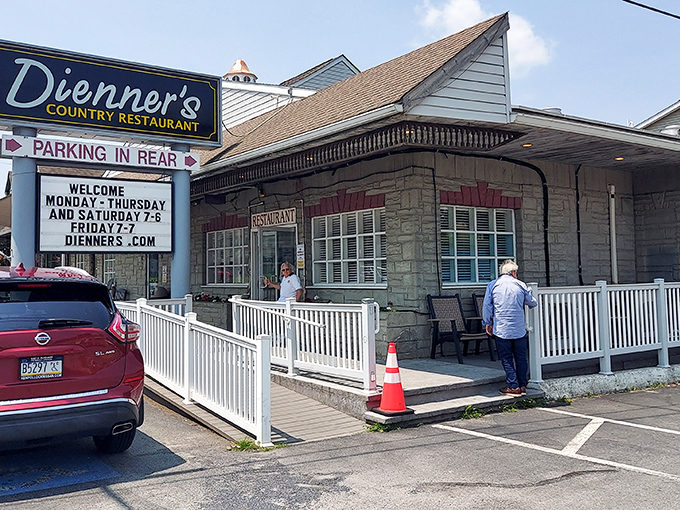 Stone facade meets white railings in a combination that whispers "come in, we've been expecting you."