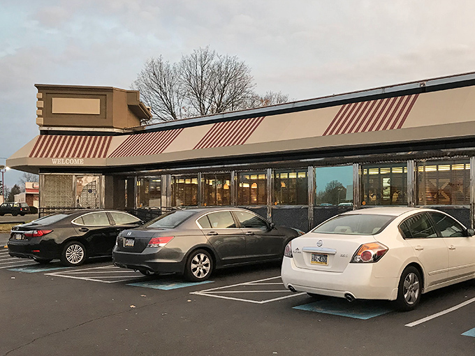 The classic diner silhouette against Pennsylvania sky &ndash; where breakfast dreams come true and diet plans go to die.