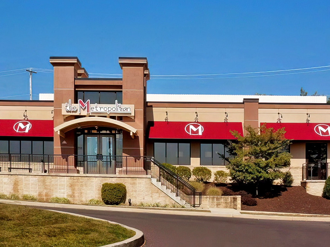 The iconic red awning with that distinctive "M" logo promises comfort food paradise in North Wales. Like a culinary lighthouse guiding hungry travelers home.