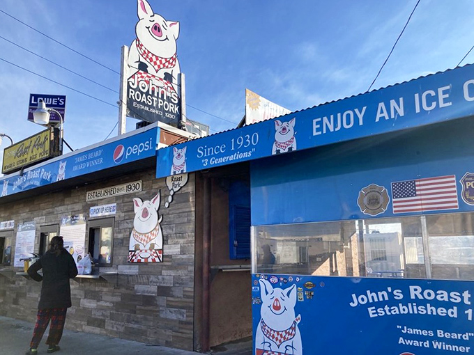 The iconic pig sign beckons hungry pilgrims like a neon North Star. This unassuming shack has more culinary credibility than most five-star restaurants.