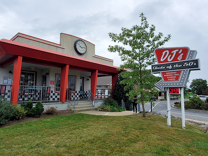 The classic red and white exterior of DJ's Taste of the 50's stands as a beacon of nostalgia along Lancaster's roadways, complete with that iconic neon sign.