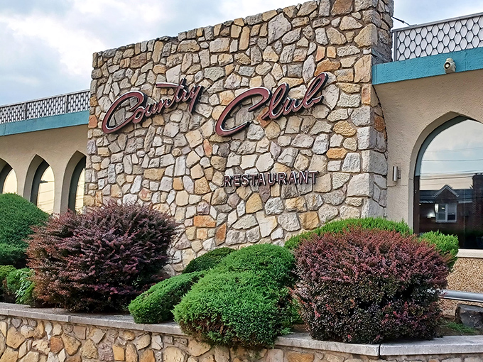 The stone facade of Country Club Diner stands like a mid-century monument to comfort food, promising delicious memories before you even step inside.