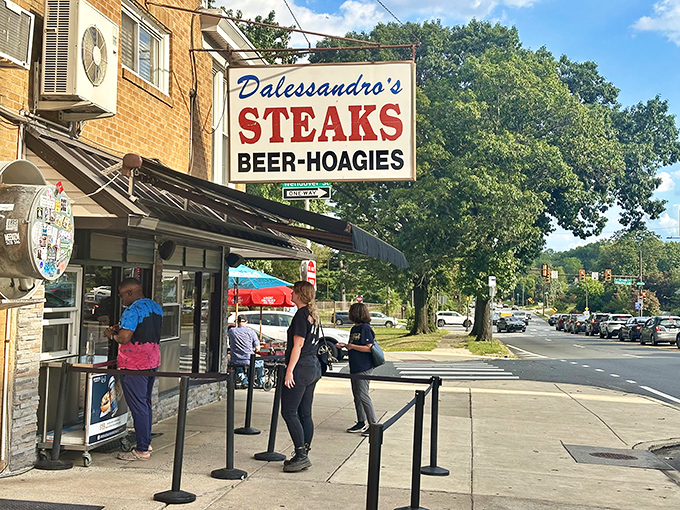 The iconic Dalessandro's sign beckons hungry pilgrims to this Roxborough temple of cheesesteak worship. The line forming outside? That's your first clue to greatness.