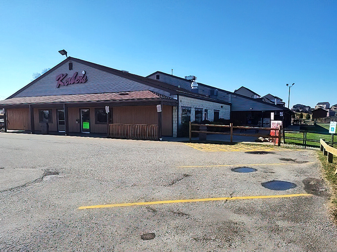 The iconic blue-roofed building with its bold red "Kerber's" sign stands like a beacon of dairy delight in Irwin's rolling countryside.