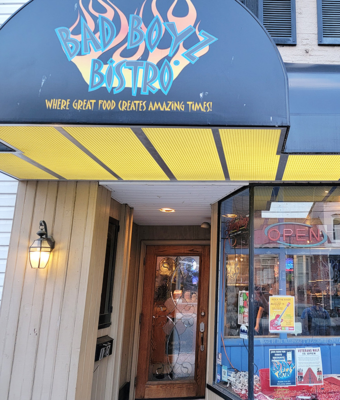 The iconic Bad Boyz Bistro sign promises "great food creates amazing times" &ndash; a bold claim that somehow still manages to undersell what awaits inside.