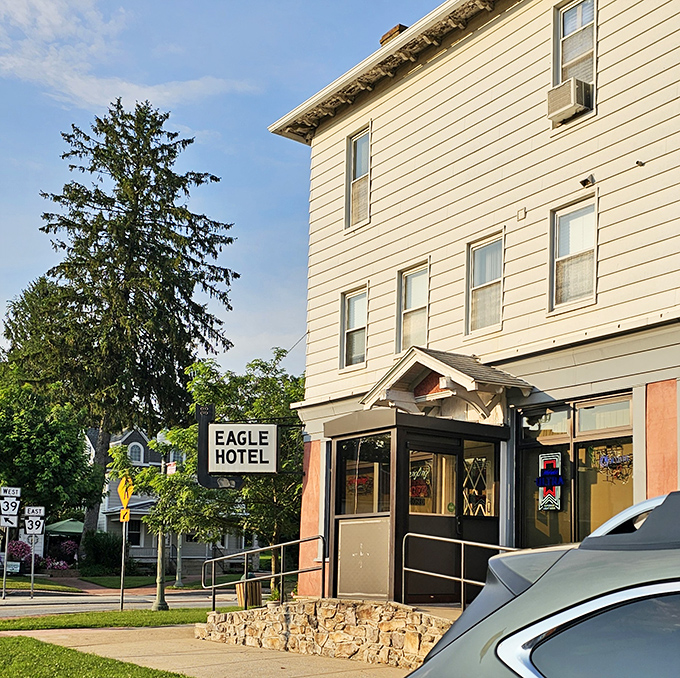 The unassuming exterior of Eagle Hotel stands like a culinary sentinel, promising treasures within that no flashy neon sign could adequately advertise.