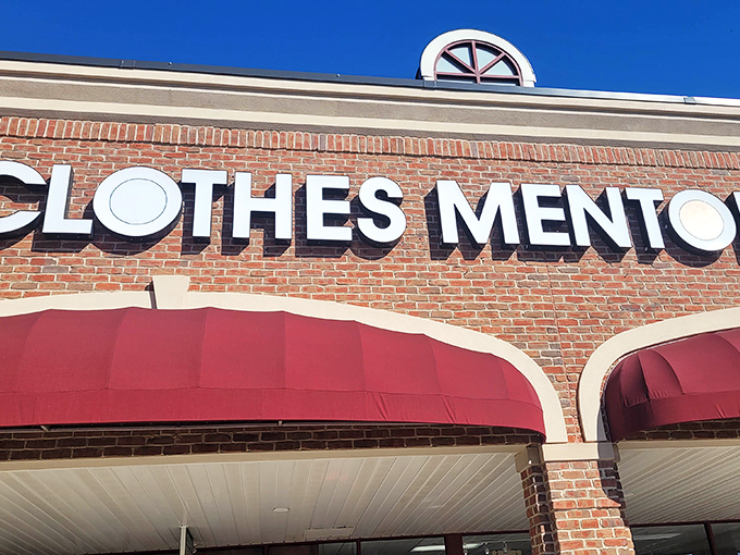 The brick facade and bold red awnings of Clothes Mentor aren't just eye-catching&mdash;they're practically waving you in like a fashion-forward friend with insider deals.
