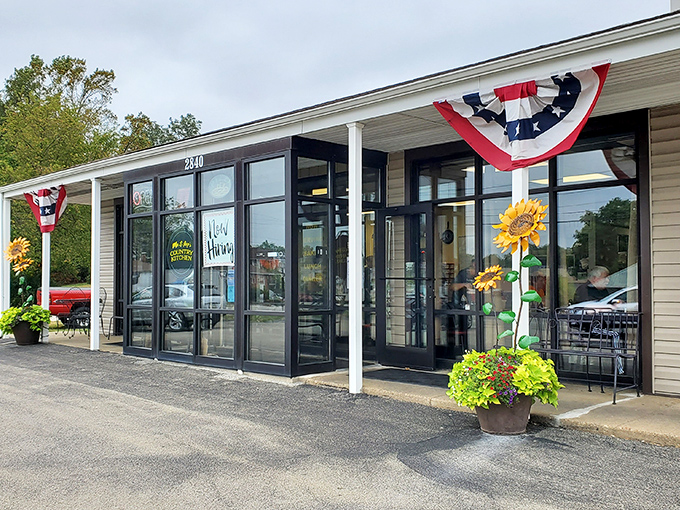 The unassuming exterior of Ma and Pop's Country Kitchen proves that patriotic bunting and cheerful sunflowers are the universal language for "get in here, hungry traveler."