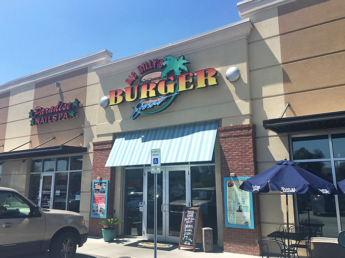 The unmistakable Big Billy's sign beckons burger enthusiasts like a tropical oasis in a strip mall desert. Palm tree logo? Check. Hunger pangs? Inevitable.