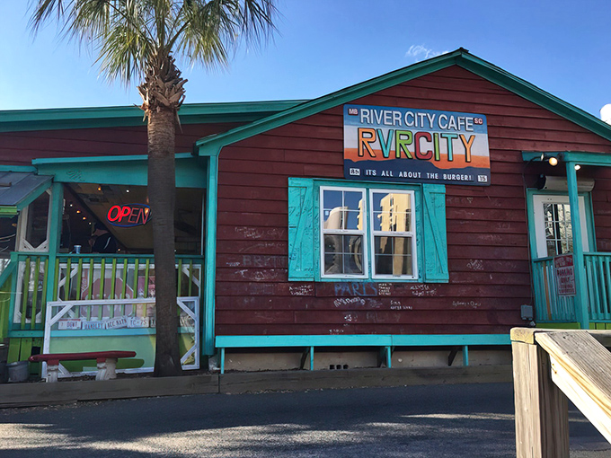 The weathered burgundy siding and turquoise trim scream "beach shack with attitude." This isn't where you go to impress a first date&mdash;it's where you take someone you actually like.