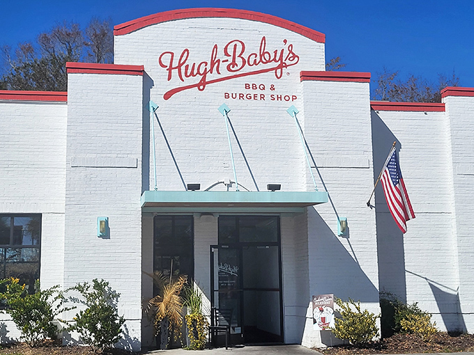 The clean white brick and red trim of Hugh-Baby&rsquo;s make a bold first impression&mdash;setting the stage for burgers and barbecue done the old-school, satisfying way.