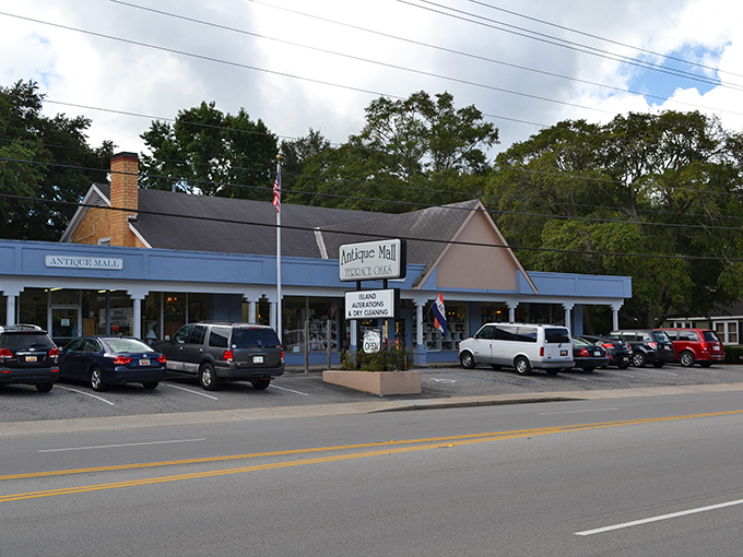 The unassuming blue-trimmed exterior of Terrace Oaks Antique Mall &ndash; where Charleston's past awaits behind a modest fa&ccedil;ade that belies the treasures within.