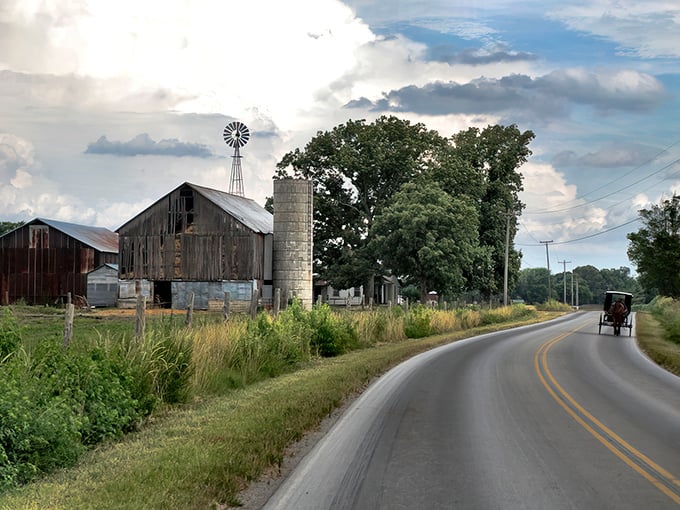 A classic rural Tennessee scene: weathered barn, towering silo, and the gentle clip-clop of an Amish buggy rounding the bend. Time travel without the DeLorean.