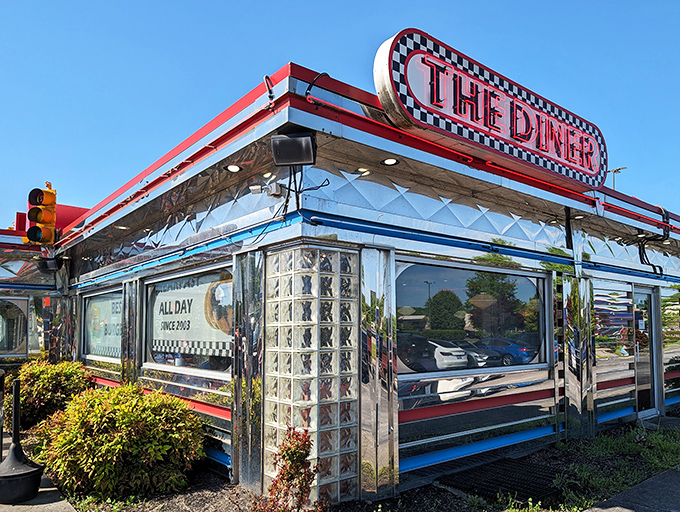 The gleaming chrome exterior of The Diner shines like a beacon of nostalgia on Dolly Parton Parkway, promising a time-traveling culinary adventure.