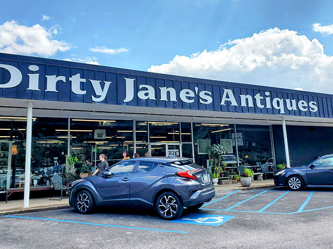 The blue storefront of Dirty Jane's beckons like a portal to the past, promising treasures that IKEA simply cannot provide.
