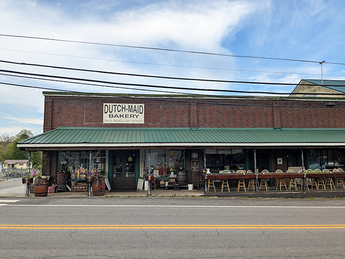 The charming storefront of Dutch Maid Bakery beckons with rustic barrels and vintage decor &ndash; like a time machine disguised as Tennessee's sweetest destination.