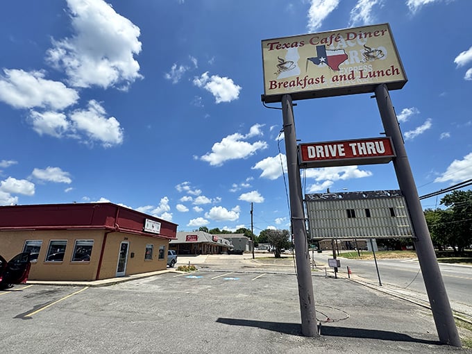 That classic roadside sign against the big Texas sky &ndash; like a beacon calling to hungry travelers and locals alike.