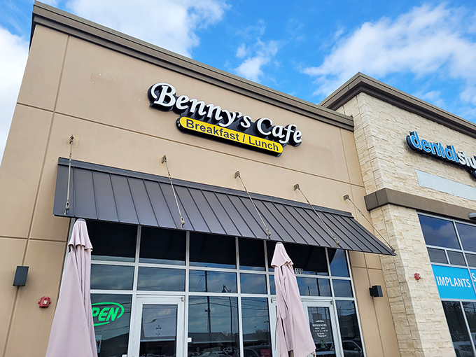 Benny's Cafe stands proudly against the Texas sky, its simple exterior hiding breakfast treasures that would make a waffle connoisseur weep with joy.