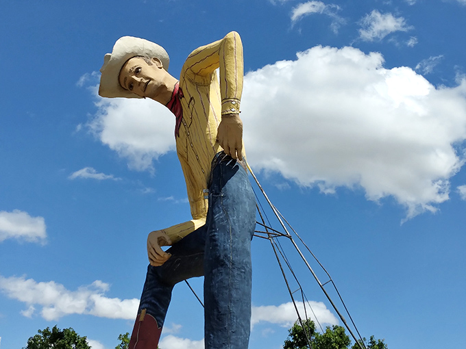 Meet Tex Randall, the forty-seven-foot cowboy who's been greeting highway travelers with unwavering Western hospitality since the 1960s.