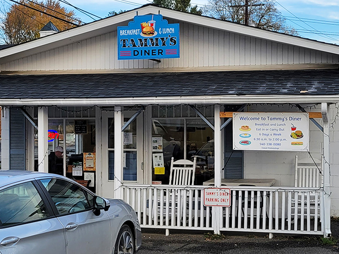 The white clapboard exterior of Tammy's Diner stands like a beacon of breakfast hope against the Virginia sky, promising comfort food without pretension.