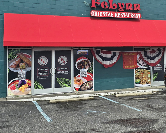 The vibrant turquoise and red exterior of Felynn Oriental Restaurant stands out like a culinary beacon, promising authentic Filipino flavors behind those photo-adorned doors.