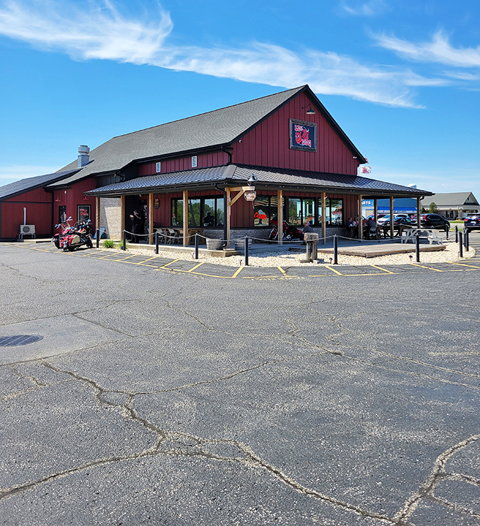 The red barn-like structure of LD's BBQ stands proudly against Wisconsin's blue sky, a beacon of smoked meat salvation in East Troy.