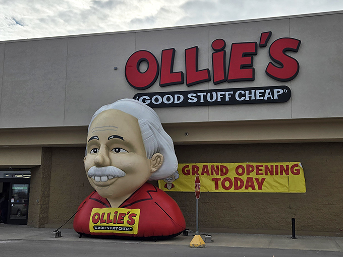 The smiling mascot outside Ollie's isn't just welcoming shoppers&mdash;it's practically announcing "your wallet is about to have a very good day!"