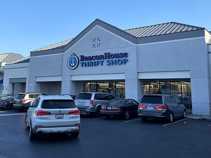 The terracotta-colored façade with its cheerful lighthouse logo promises treasure hunting adventures within. No fancy designer boutique prices here—just honest-to-goodness bargains.