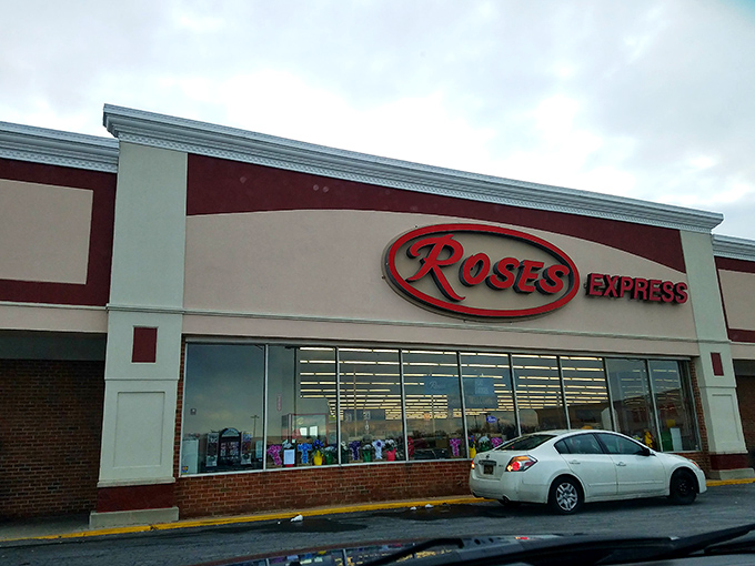 The iconic red Roses Express sign beckons bargain hunters like a retail lighthouse guiding ships to shore&mdash;promising treasures within those unassuming walls.