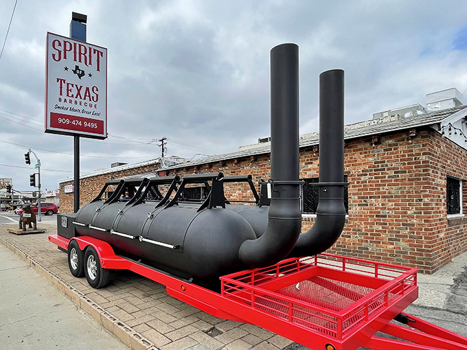 The massive red-and-white sign against the brick hints at barbecue tradition, and Spirit of Texas Barbecue delivers on it spectacularly.