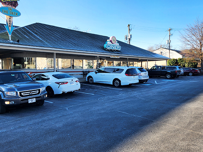 The neon-crowned Soda Jerk Diner stands like a time machine in Hummelstown's landscape, its parking lot filled with cars from across Pennsylvania seeking that perfect nostalgic bite.
