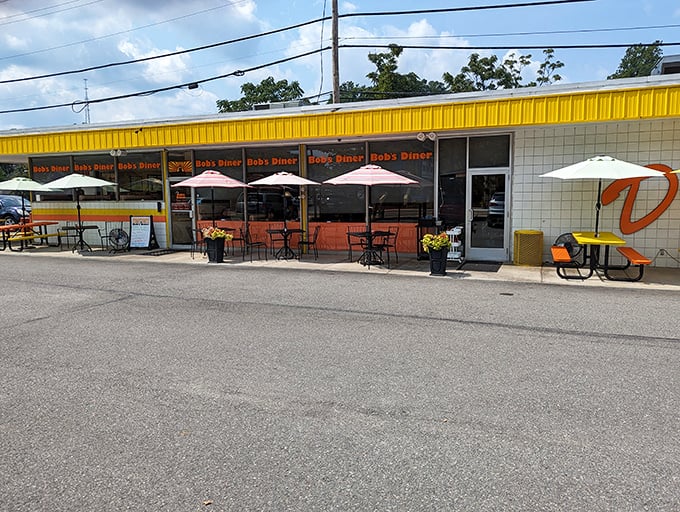 The sunshine-yellow awning of Bob's Diner beckons hungry travelers like a breakfast lighthouse on Carnegie's main drag.