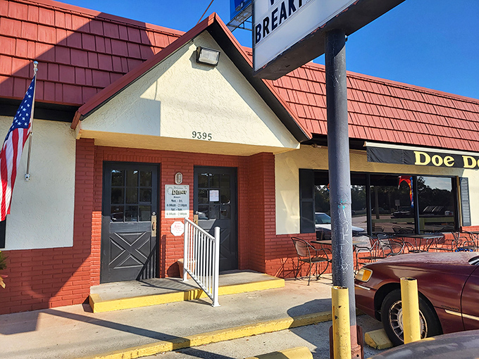 The classic red-roofed exterior of Doe Doe's beckons like an old friend, promising comfort food and zero pretension.