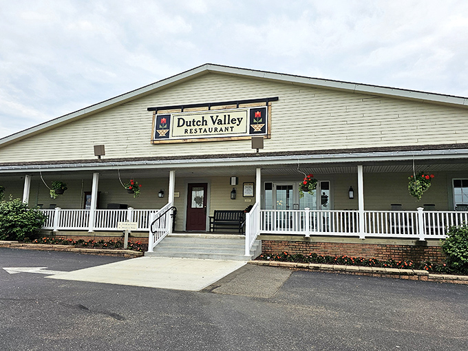 The welcoming facade of Dutch Valley Restaurant beckons like a friendly neighbor inviting you over for Sunday dinner. Those hanging flower baskets aren't just for show!