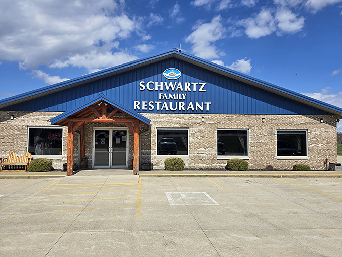 Under clear Indiana skies, Schwartz Family Restaurant's welcoming facade invites hungry travelers to discover what locals have known for years&mdash;breakfast nirvana awaits inside.
