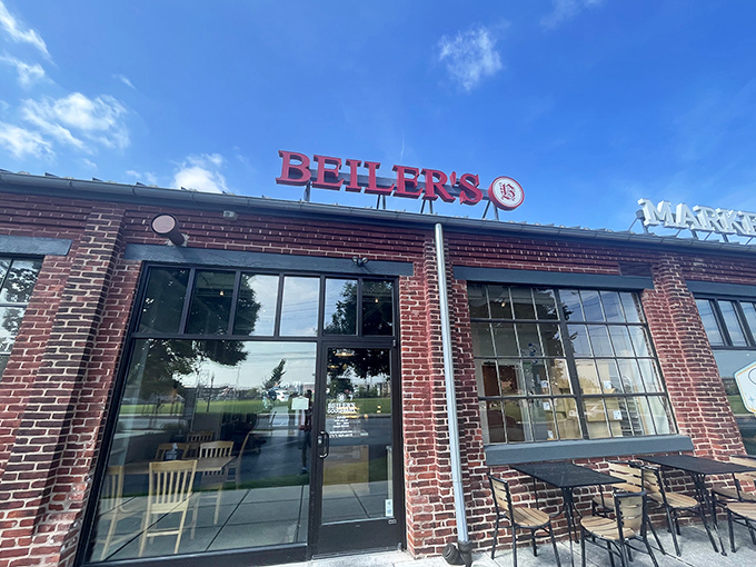 The brick facade of Beiler's welcomes donut pilgrims with its bold red signage—a beacon of sweetness in Lancaster's landscape.