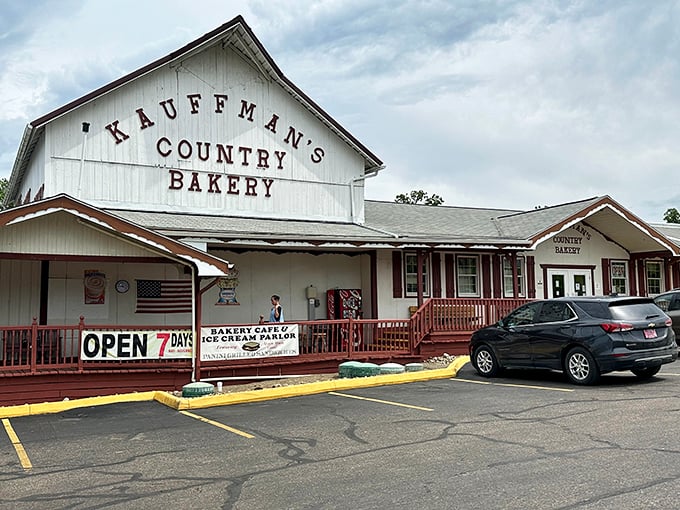 The white barn-style exterior of Kauffman's Country Bakery stands as a beacon of baked brilliance in Millersburg, promising sweet treasures within. Open seven days&mdash;because dessert emergencies don't take weekends off.