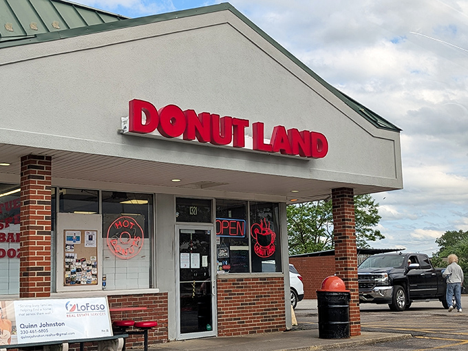 The bright red "DONUT LAND" sign beckons like a lighthouse for the sugar-deprived. Brunswick's sweetest morning destination awaits!