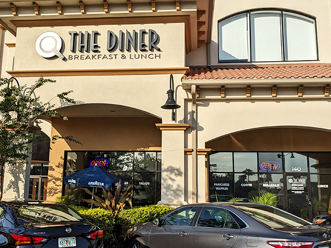 Where Mediterranean charm meets breakfast bliss. @ The Diner's welcoming exterior says "come for the waffles, stay for the coffee refills."