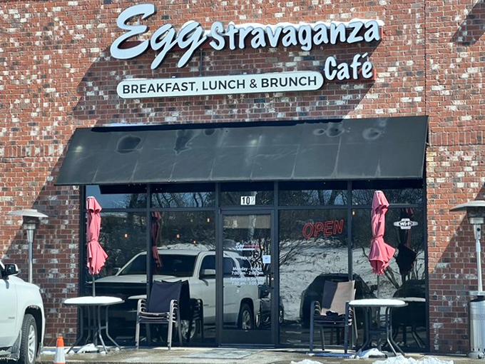 The brick exterior of Eggstravaganza Cafe promises little, delivers everything. Those packed parking spaces tell the real story&mdash;breakfast worth getting dressed for.