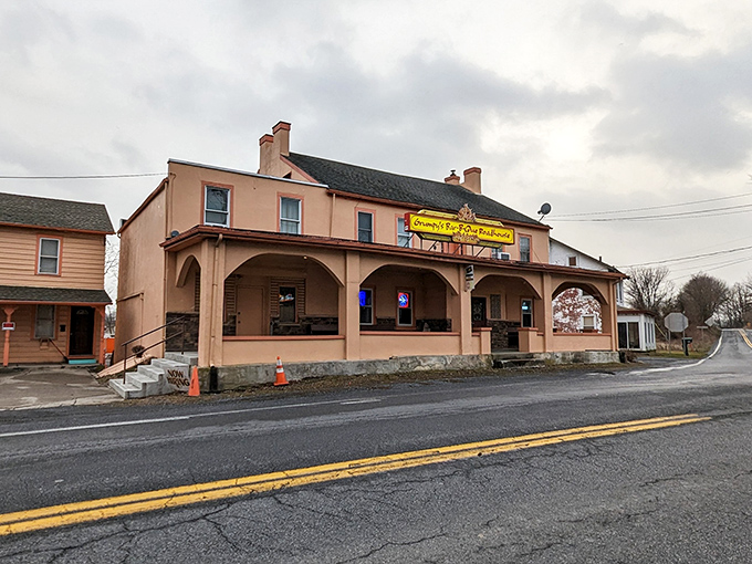 The peach-colored exterior of Grumpy's stands like a barbecue beacon along the roadside, promising smoky treasures within. No fancy frills needed when the food does the talking.