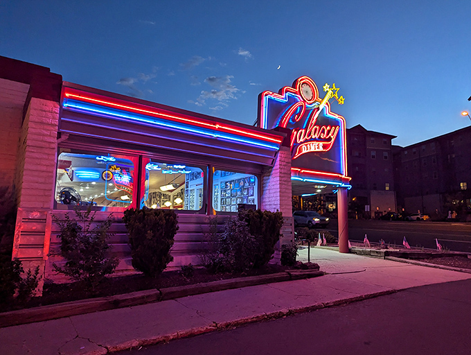 After dark, Galaxy Diner transforms into a neon wonderland, glowing like a time machine set to "delicious 1950s."