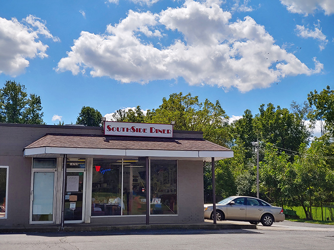 The classic roadside silhouette of Southside Diner stands against an Ohio sky, promising breakfast salvation for hungry travelers and locals alike.