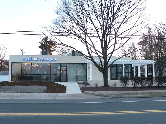 A modern Greek oasis in suburban Pennsylvania. The clean white exterior of Hellenic Kouzina promises Mediterranean magic without the passport hassle.