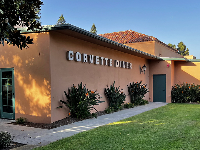 The unassuming exterior of Corvette Diner belies the time-traveling adventure waiting inside. Spanish-style architecture meets American nostalgia in San Diego's Liberty Station.