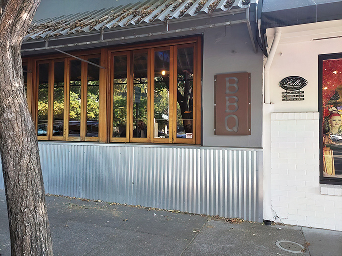 The unassuming exterior of KINSmoke hides barbecue greatness like a poker player with four aces &ndash; that corrugated metal siding is your first clue something special awaits.