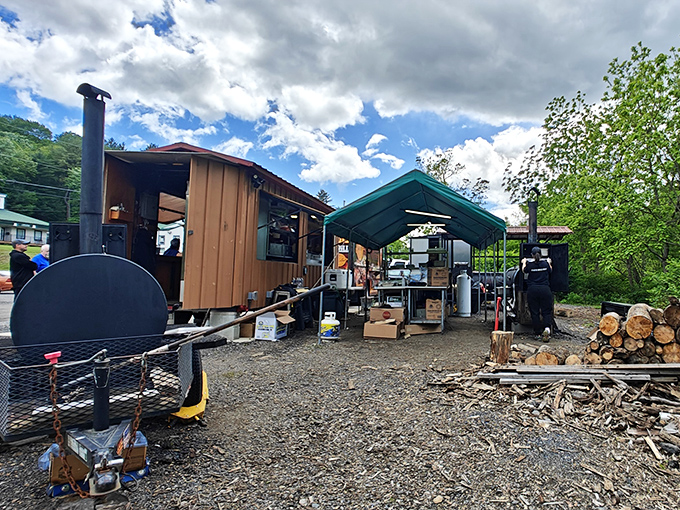The humble wooden shack and smoker setup at Big Creek Bar-B-Q proves once again that culinary greatness often hides in unassuming packages.