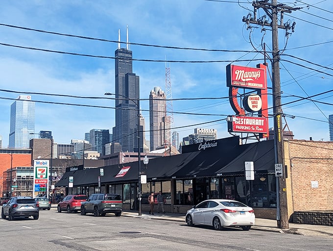 With the iconic Chicago skyline as its backdrop, Manny's red sign stands as a beacon for sandwich pilgrims seeking pastrami perfection.